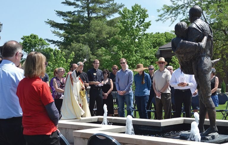 Atchison family remembers son through statue - The Leaven Catholic ...