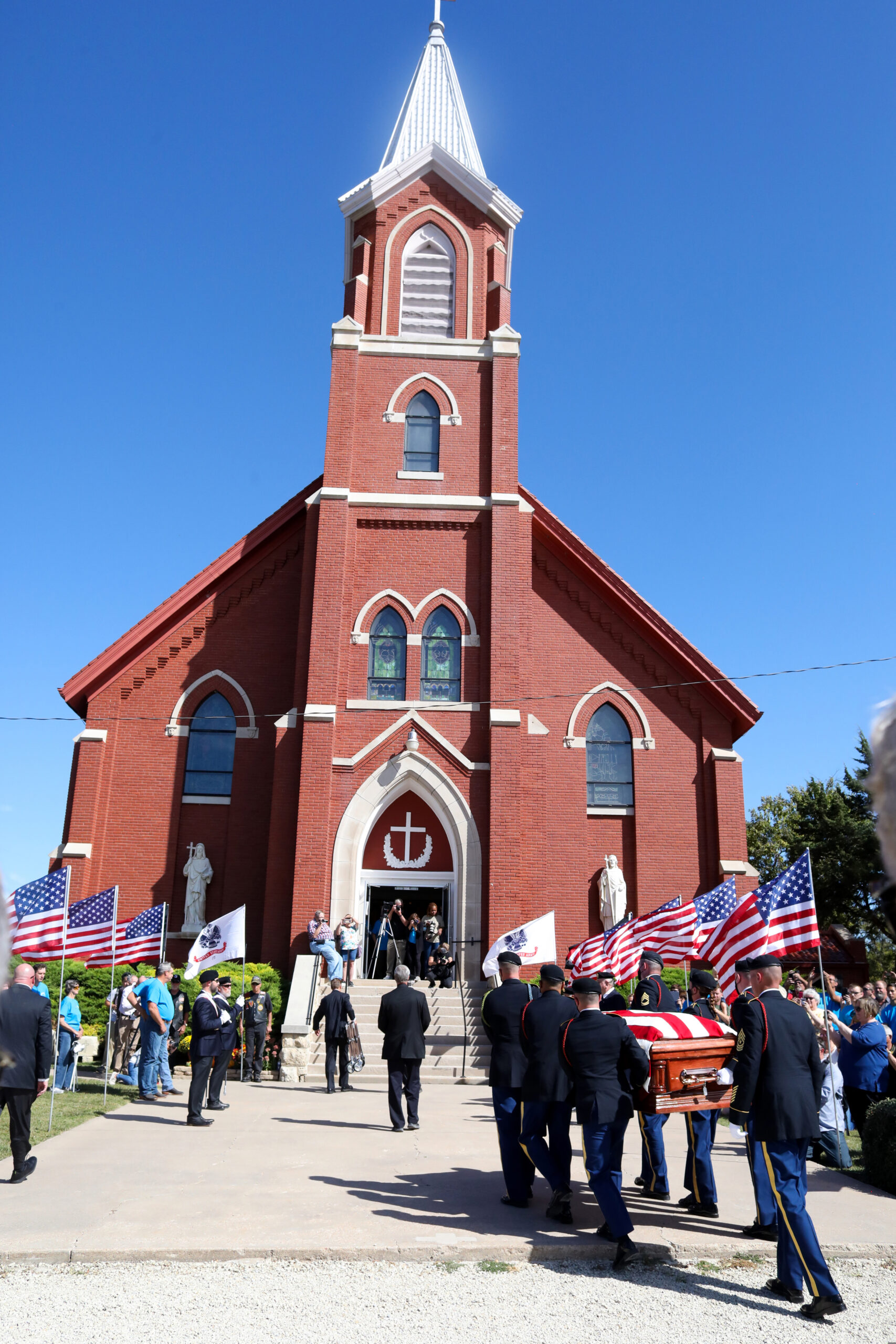 Veterans connect with Father Kapaun by pilgrimage - The Leaven Catholic ...