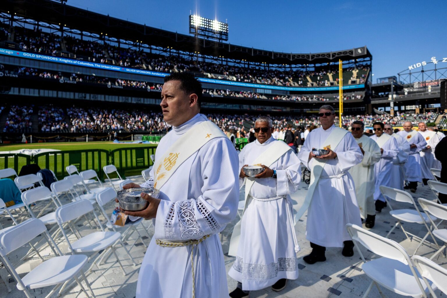 Chicagoans celebrate one of their own, with Mass and festivities ...